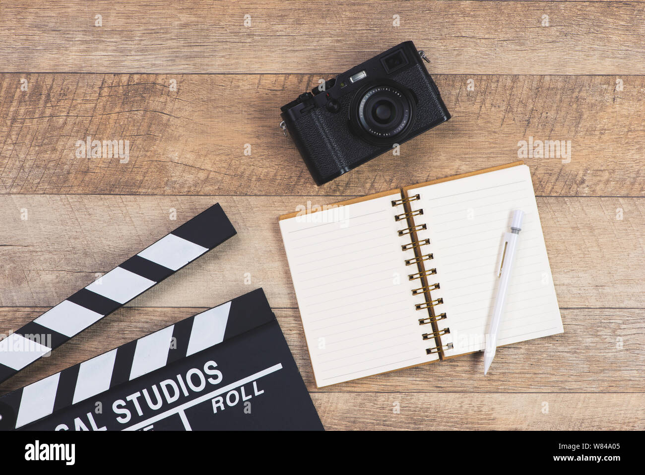 Film director desk with movie clapper board. Top view Stock Photo - Alamy