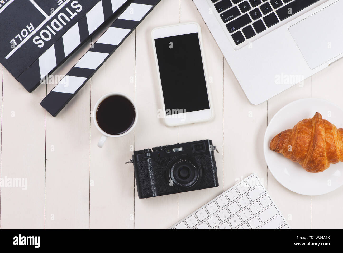 Film director desk with movie clapper board. Top view Stock Photo - Alamy