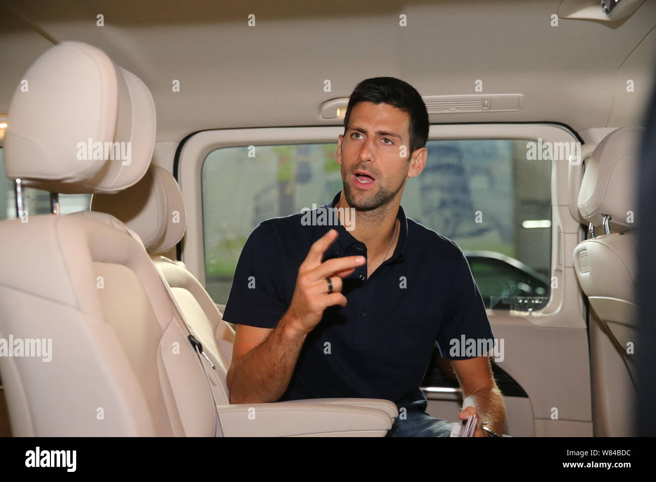 Novak Djokovic of Serbia is pictured in a car after arriving at the ...
