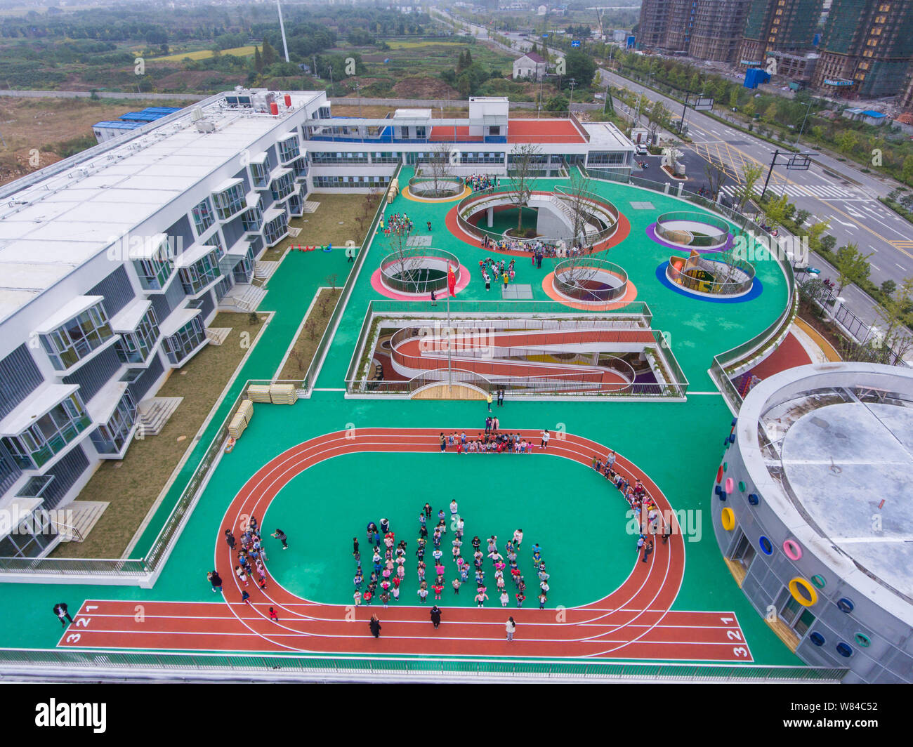 Aerial view of running tracks on the rooftop of a building at a newly ...