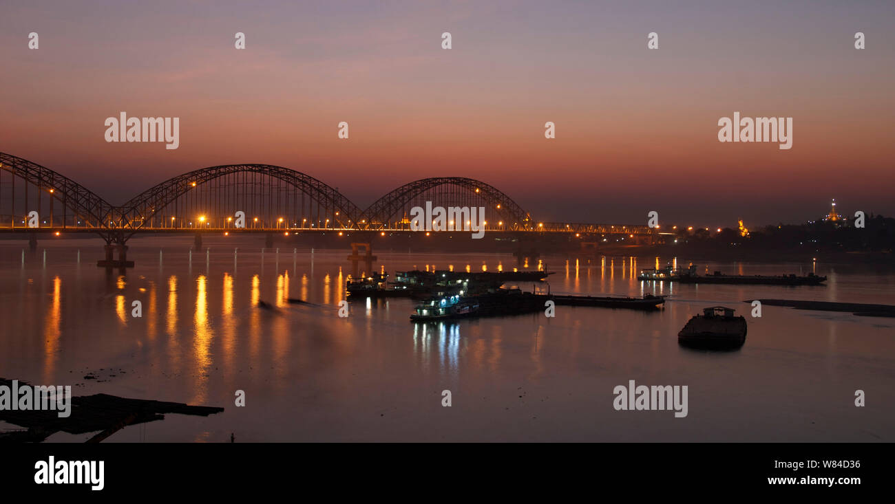 The Yadanabon bridge at dawn Stock Photo - Alamy