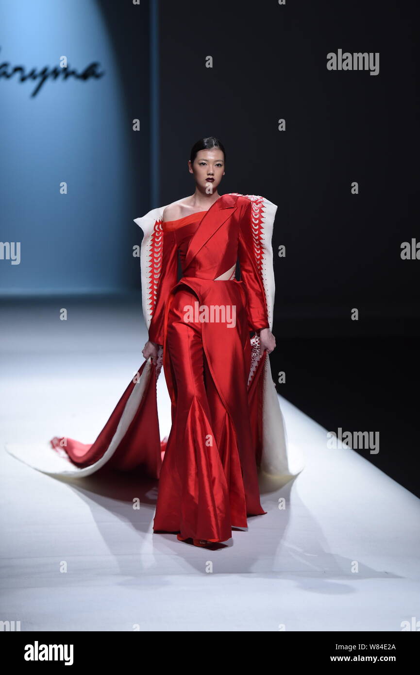 A model displays a new creation at the fashion show of Maryma fashion ...