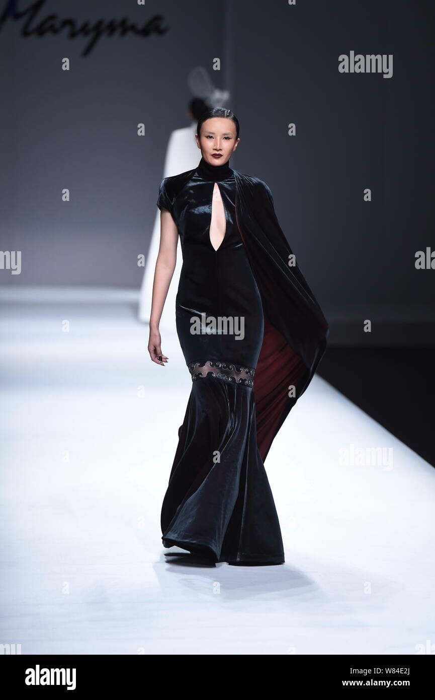 A model displays a new creation at the fashion show of Maryma fashion ...