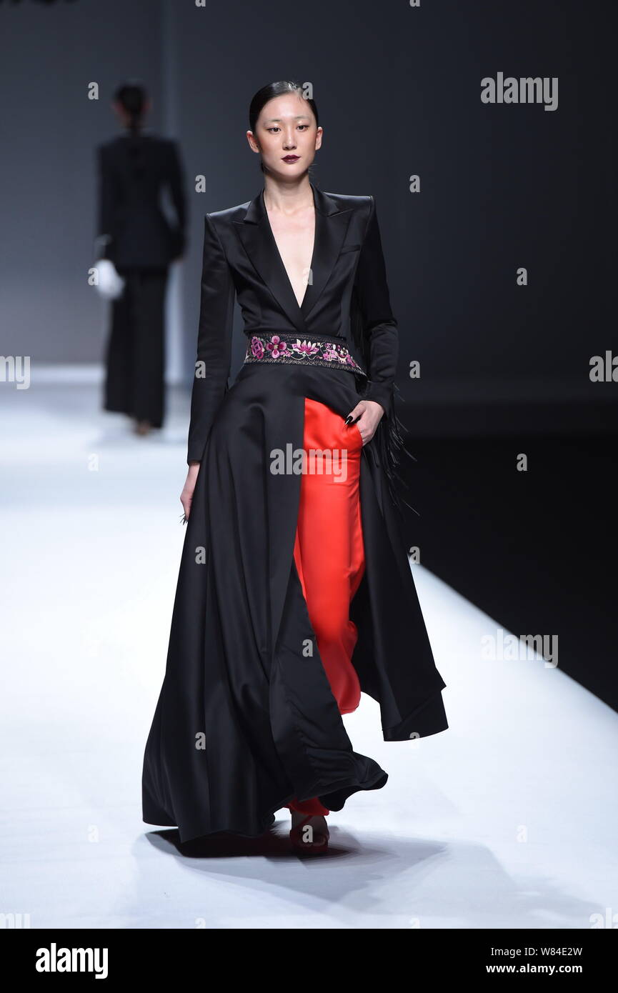 A model displays a new creation at the fashion show of Maryma fashion ...