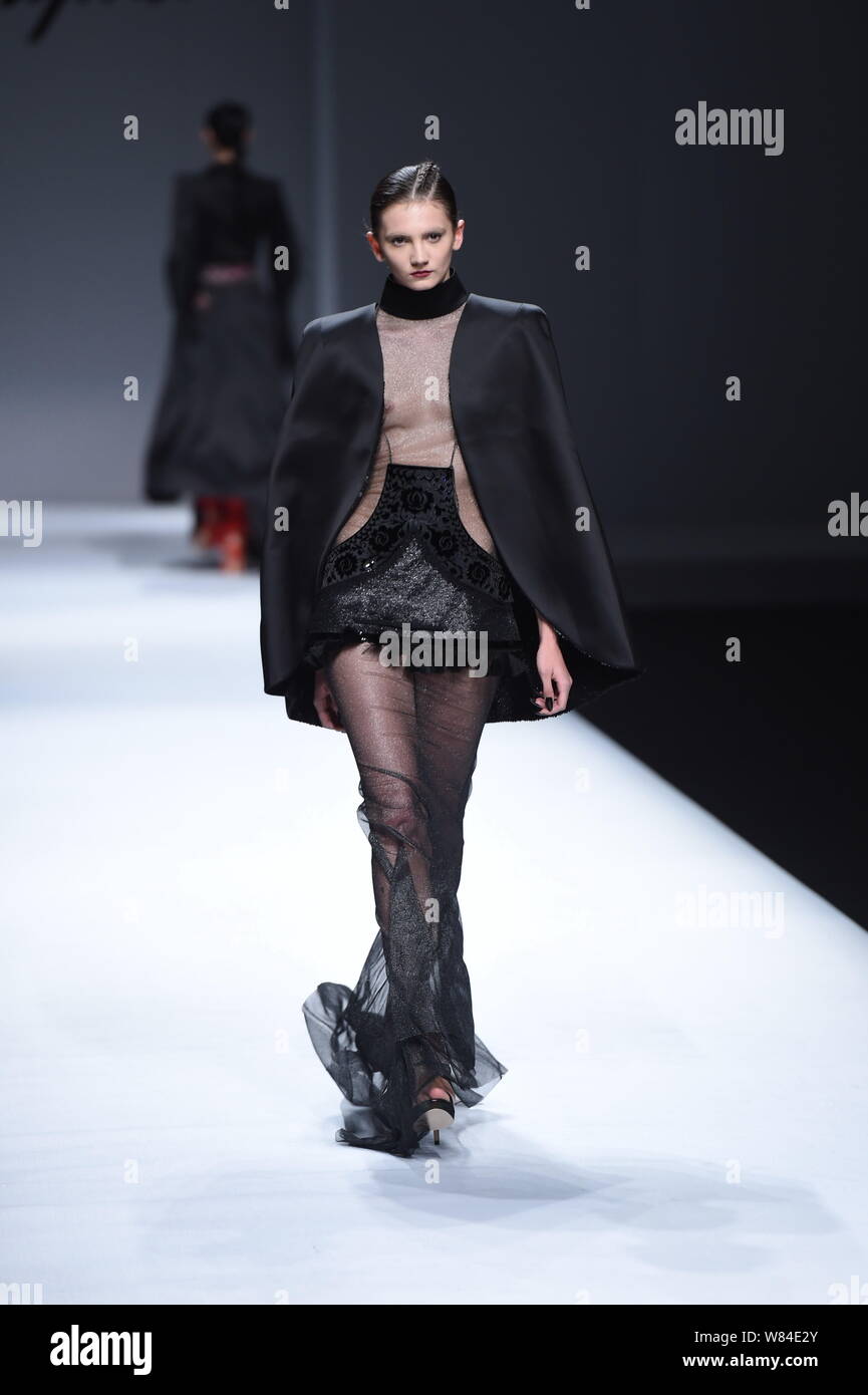 A model displays a new creation at the fashion show of Maryma fashion ...