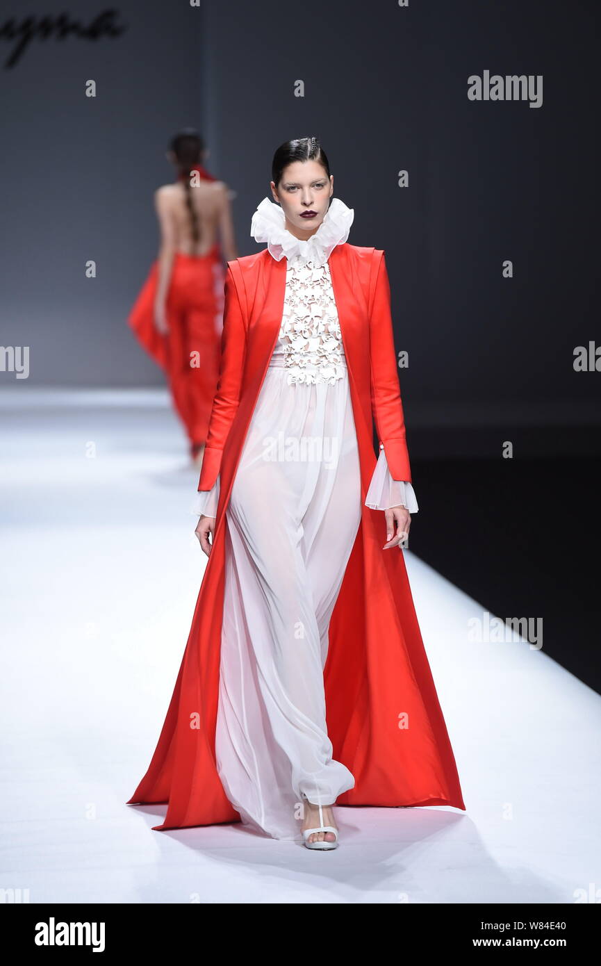 A model displays a new creation at the fashion show of Maryma fashion ...