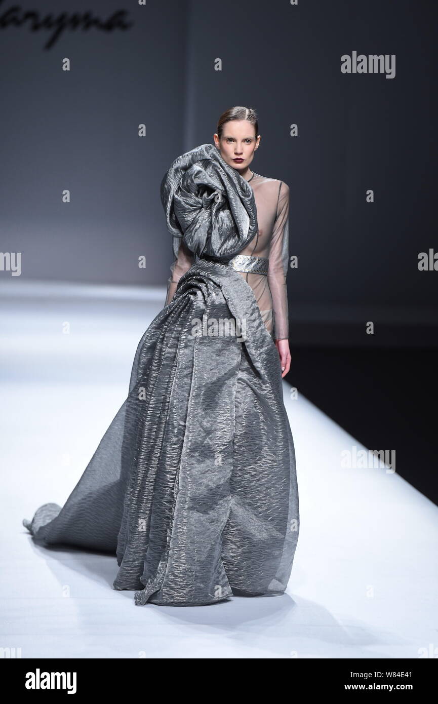 A model displays a new creation at the fashion show of Maryma fashion ...