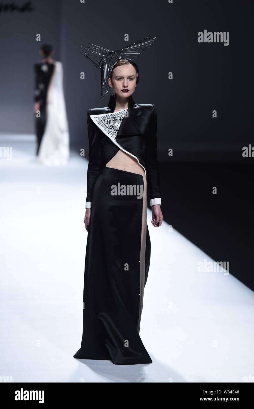 A model displays a new creation at the fashion show of Maryma fashion ...