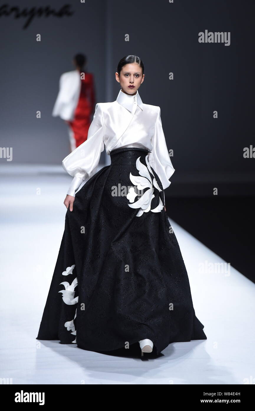 A model displays a new creation at the fashion show of Maryma fashion ...