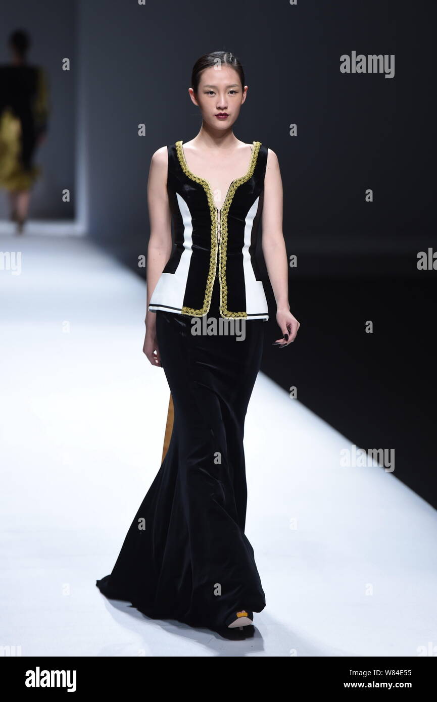 A model displays a new creation at the fashion show of Maryma fashion ...