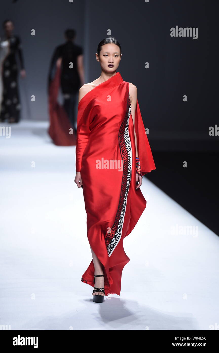 A model displays a new creation at the fashion show of Maryma fashion ...