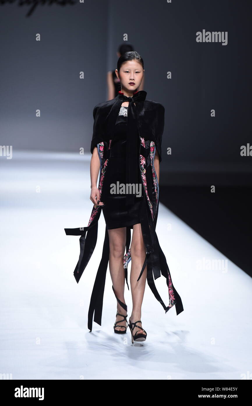 A model displays a new creation at the fashion show of Maryma fashion ...