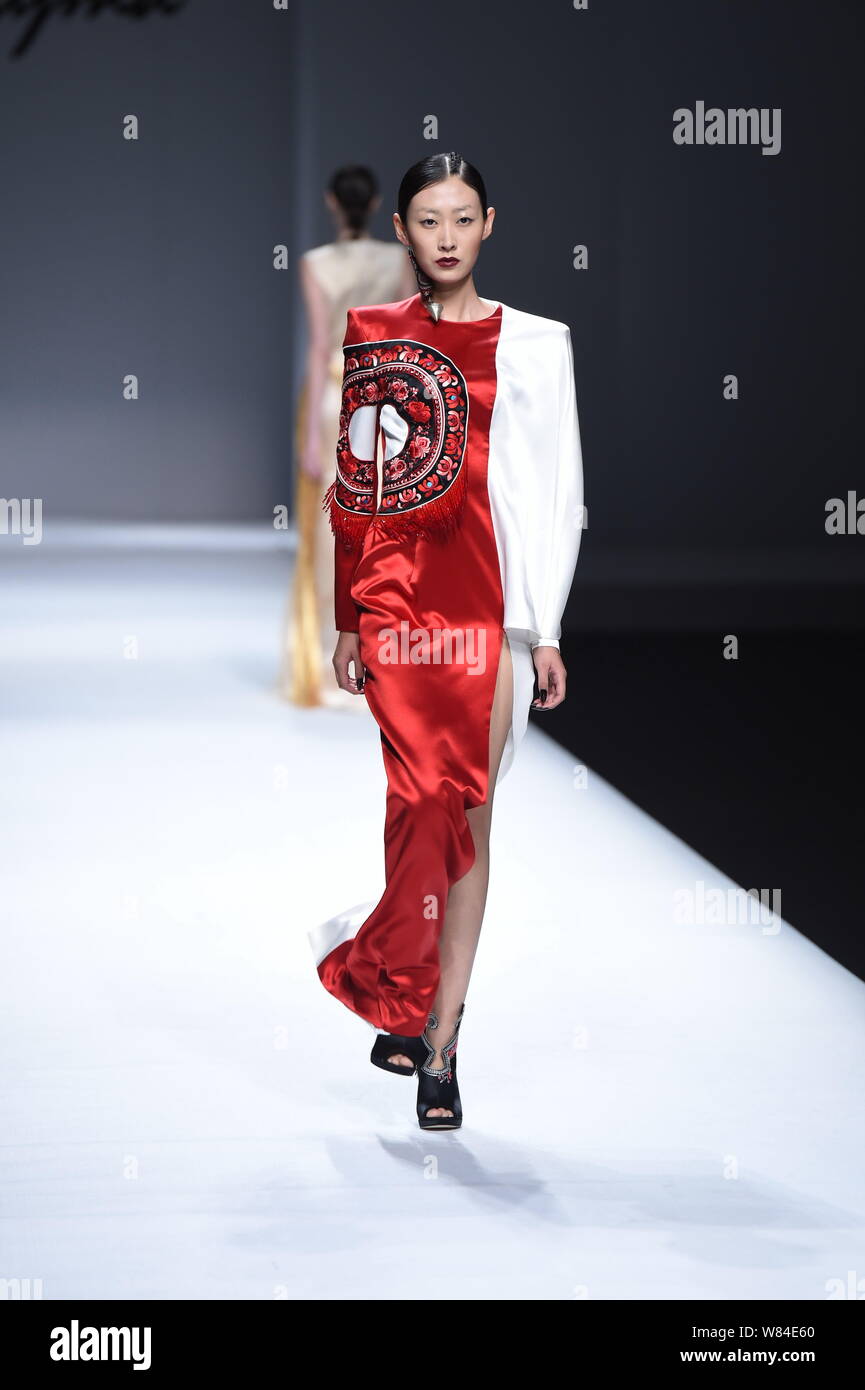 A model displays a new creation at the fashion show of Maryma fashion ...