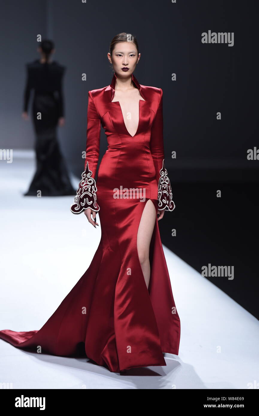 A model displays a new creation at the fashion show of Maryma fashion ...