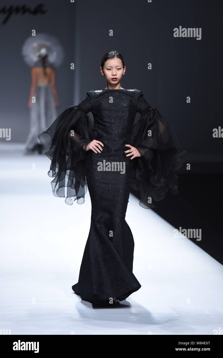 A model displays a new creation at the fashion show of Maryma fashion ...