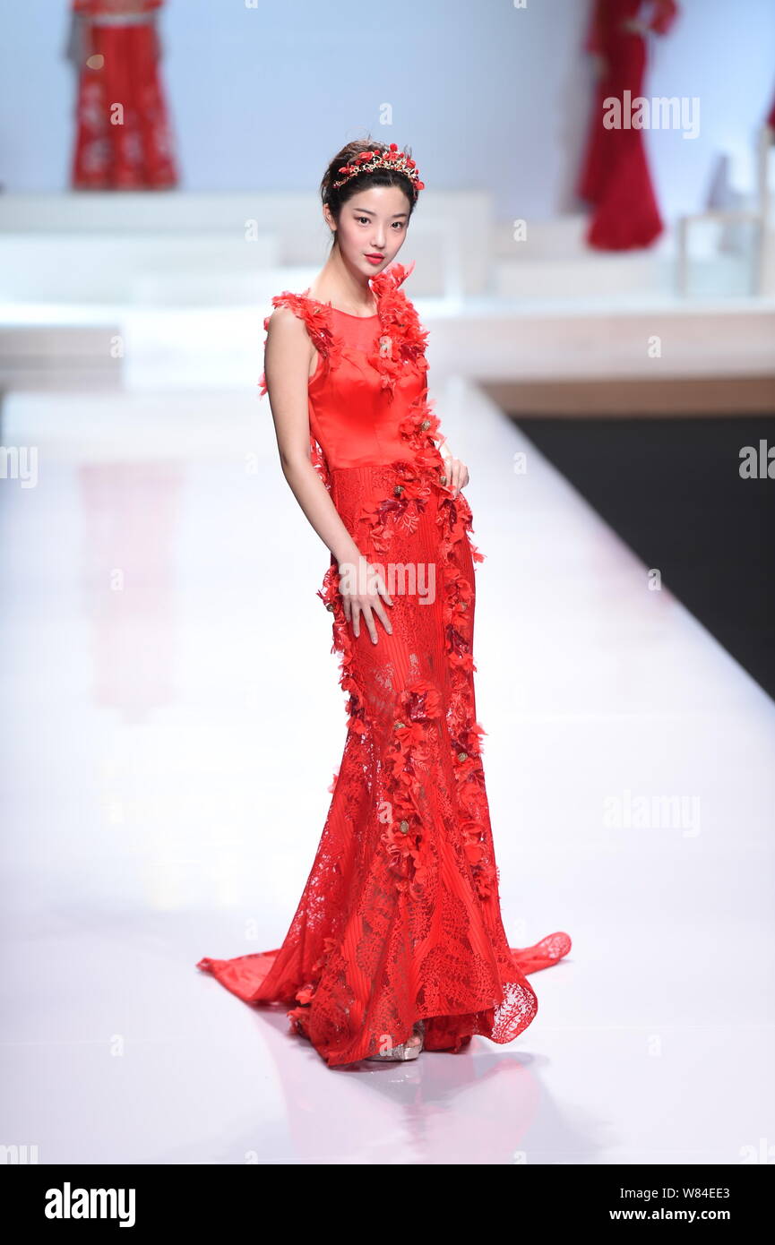 A model displays a new creation at the fashion show of Tsai Meiyue by ...