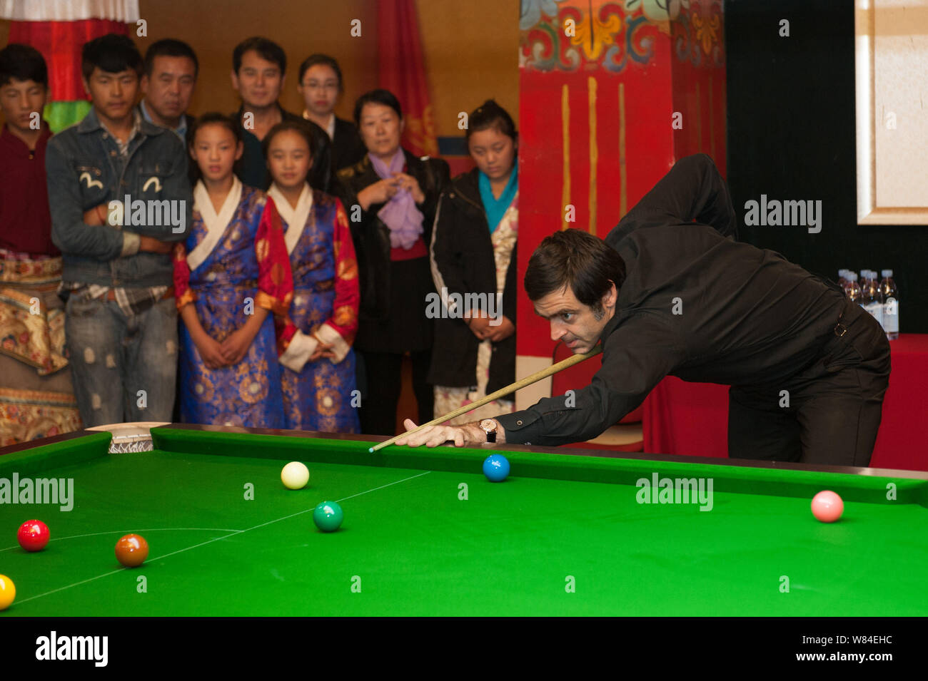 English snooker player Ronnie O'Sullivan shows his snooker skills at a ...