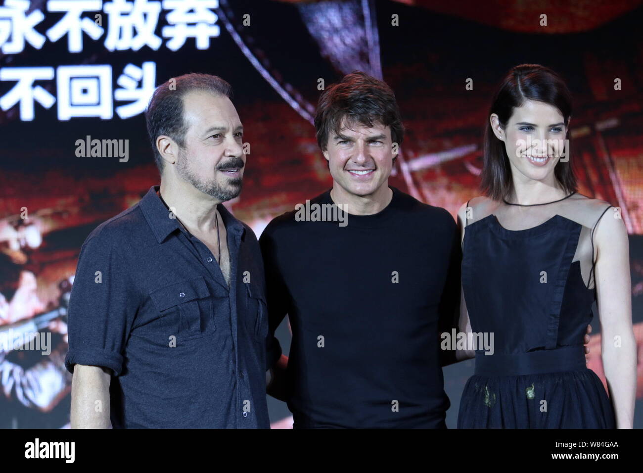 (From left) American director Edward Zwick, actor Tom Cruise and ...