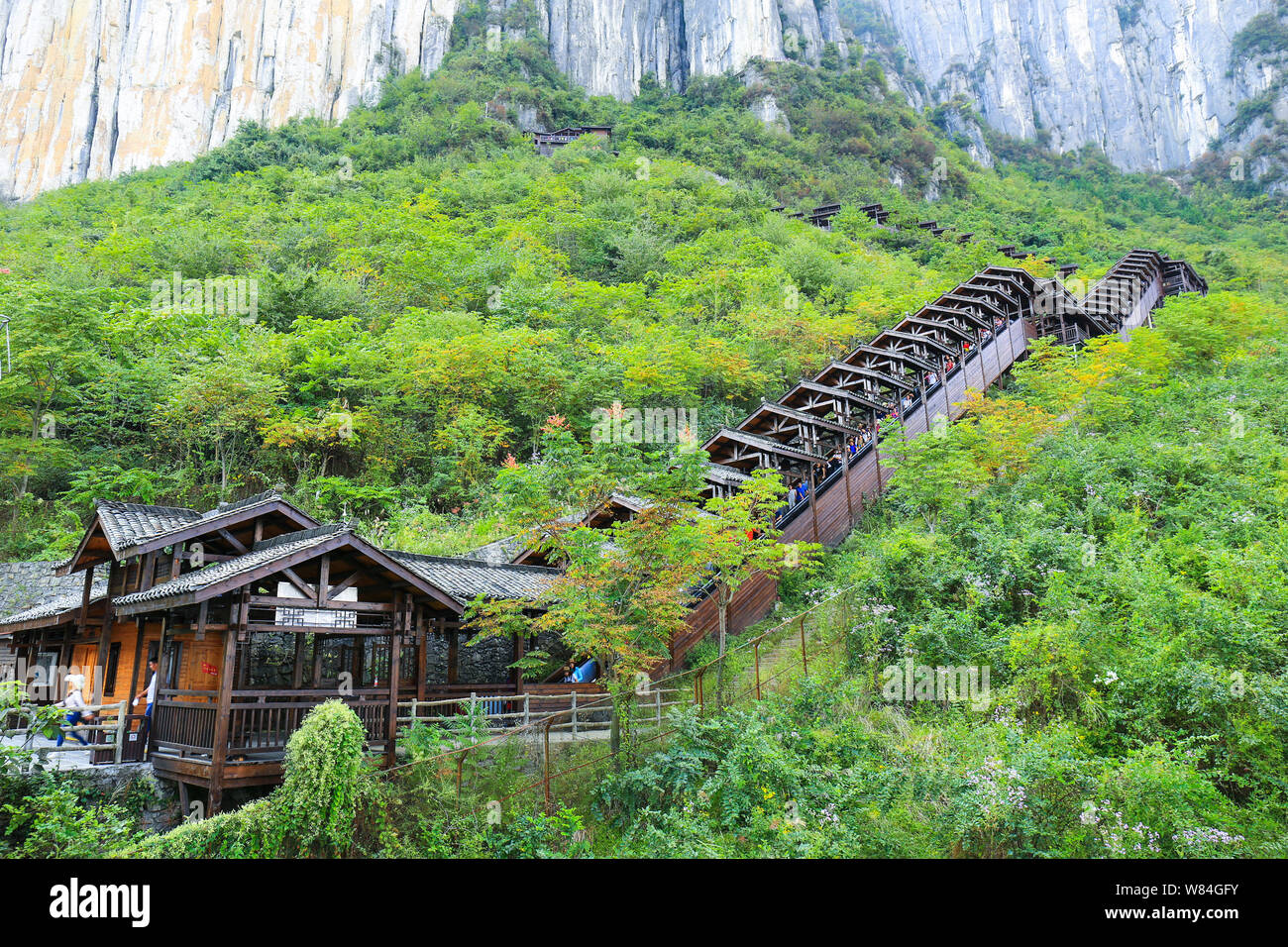 Tourists take the world's longest sightseeing escalator in the Enshi ...