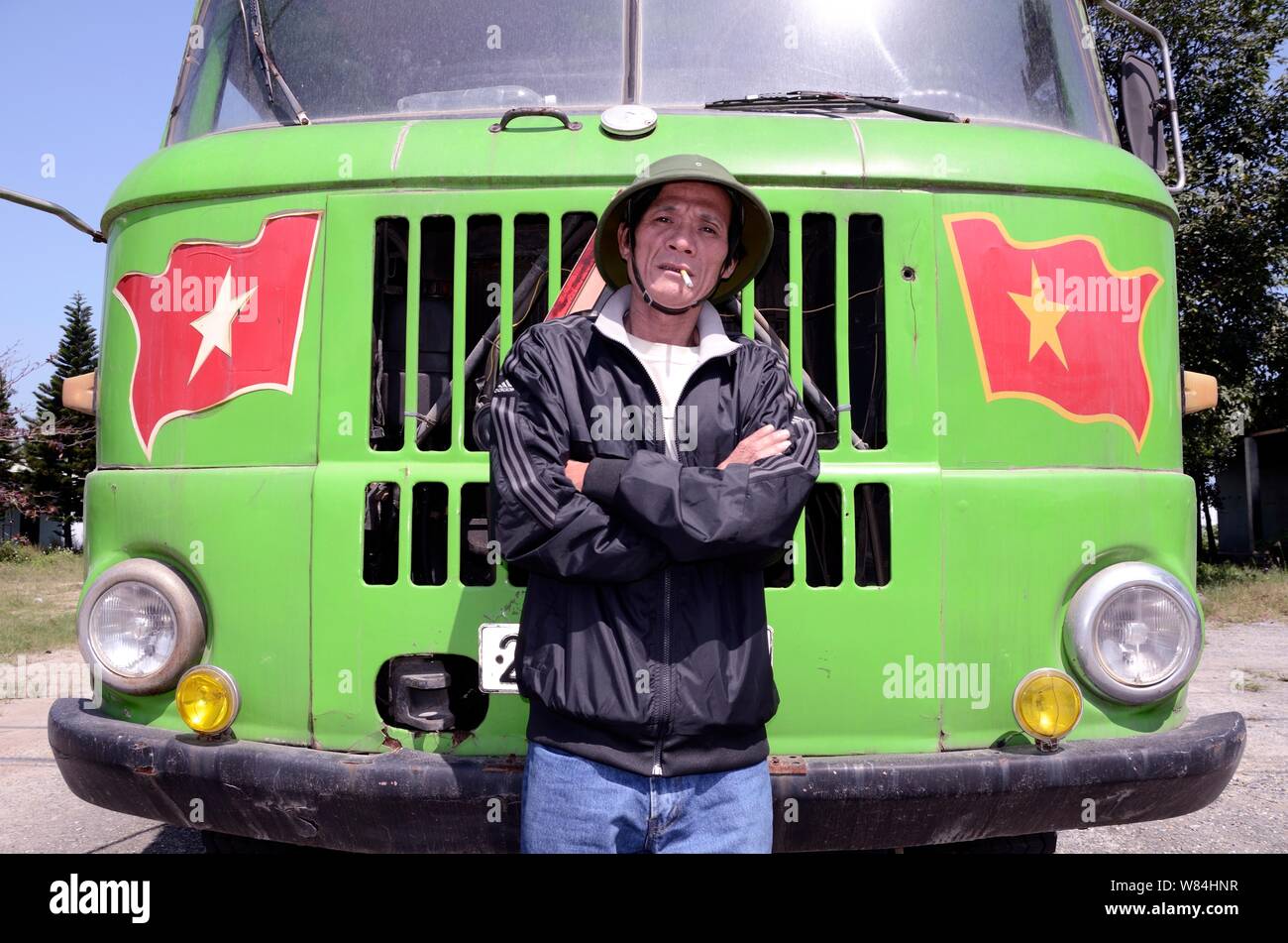 A Vietnamese driver proudly poses in front of its IFA truck Stock Photo ...