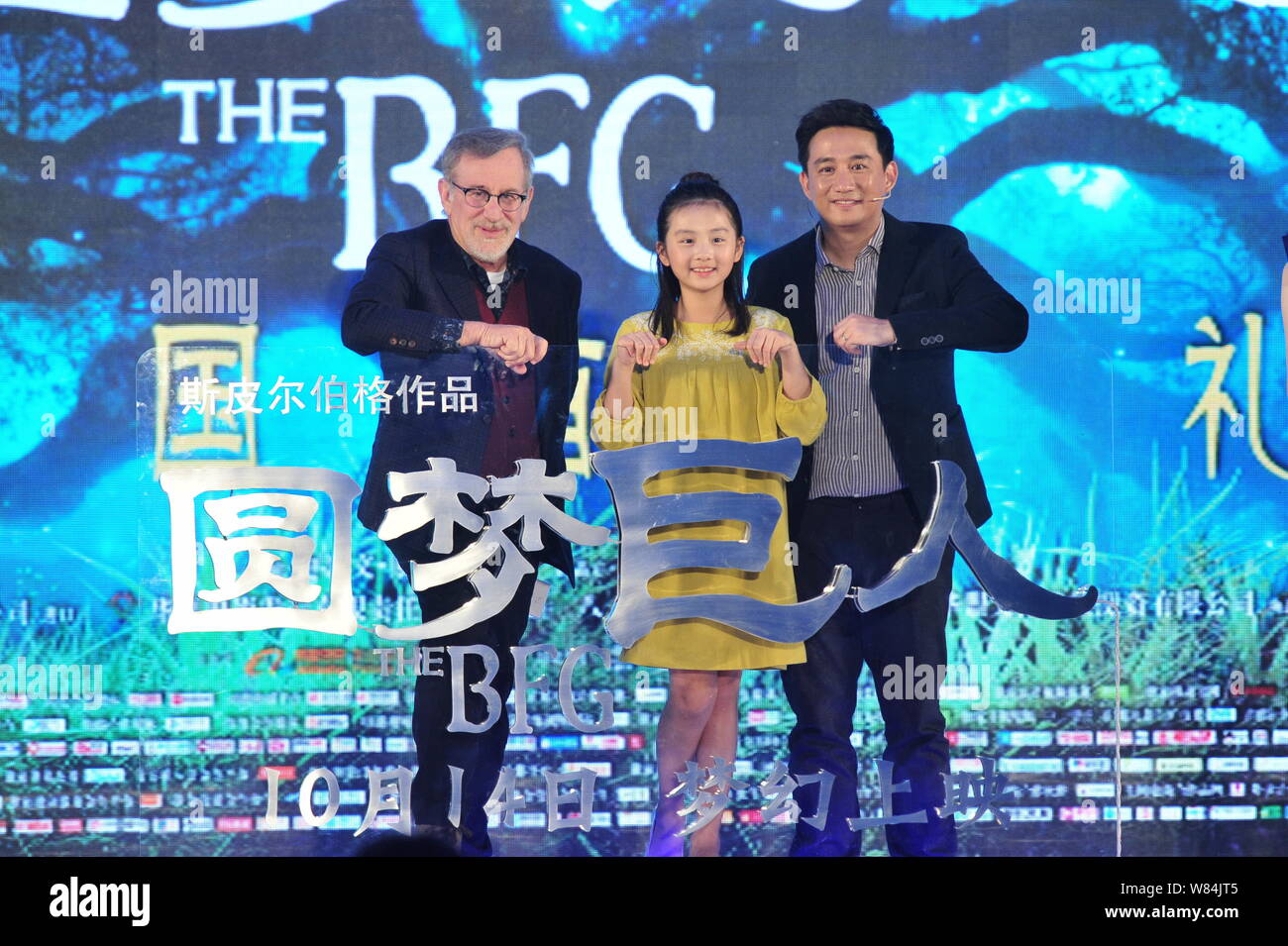 American director Steven Spielberg, left, Chinese actor Huang Lei ...