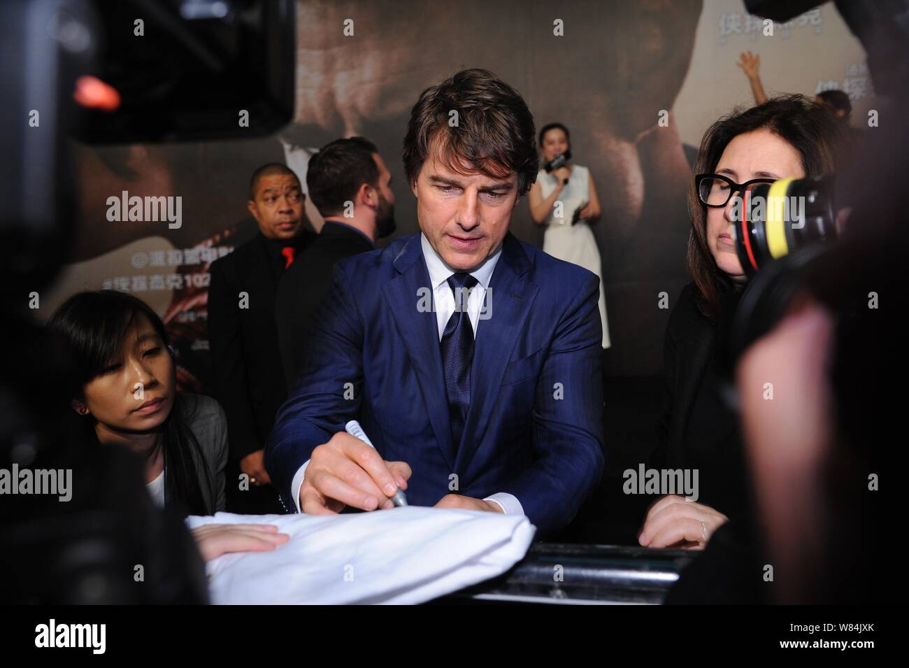 American actor Tom Cruise signs autographs for fans at a premiere event ...