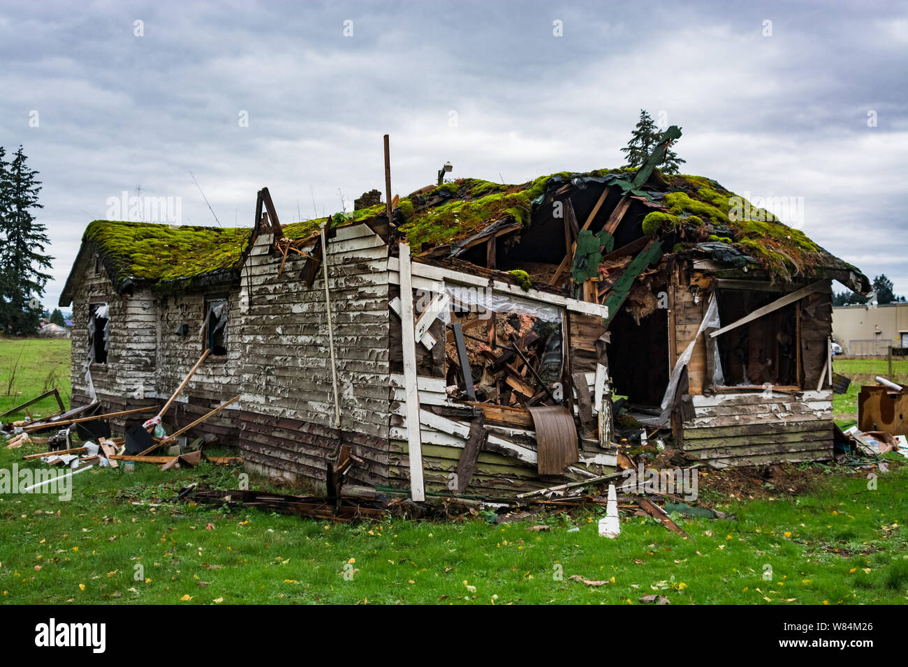 Ruins of abandoned house on cold fall day before final demolition Stock ...