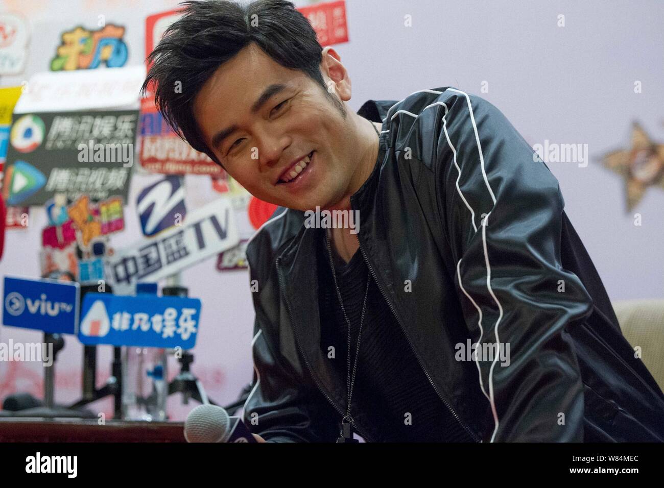 Taiwanese singer and actor Jay Chou reacts at a press conference for ...