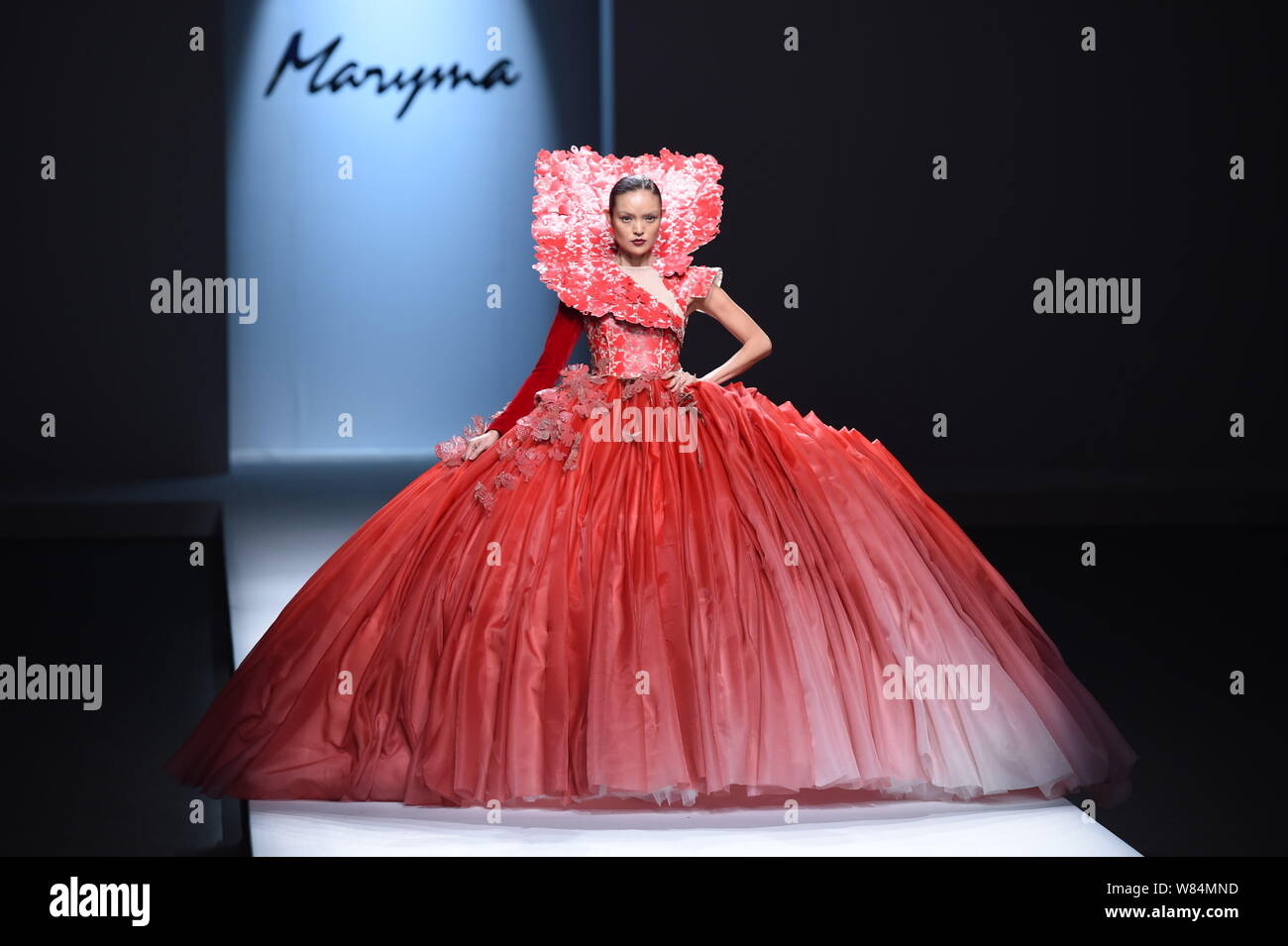A model displays a new creation at the fashion show of Maryma fashion ...