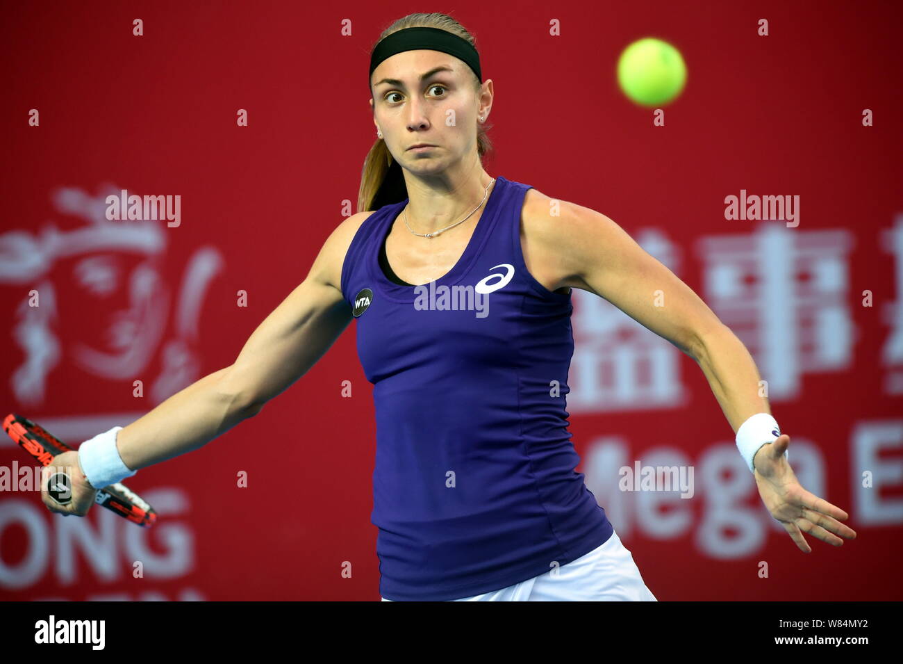 Aleksandra Krunic of Serbia returns a shot to compatriot Jelena ...