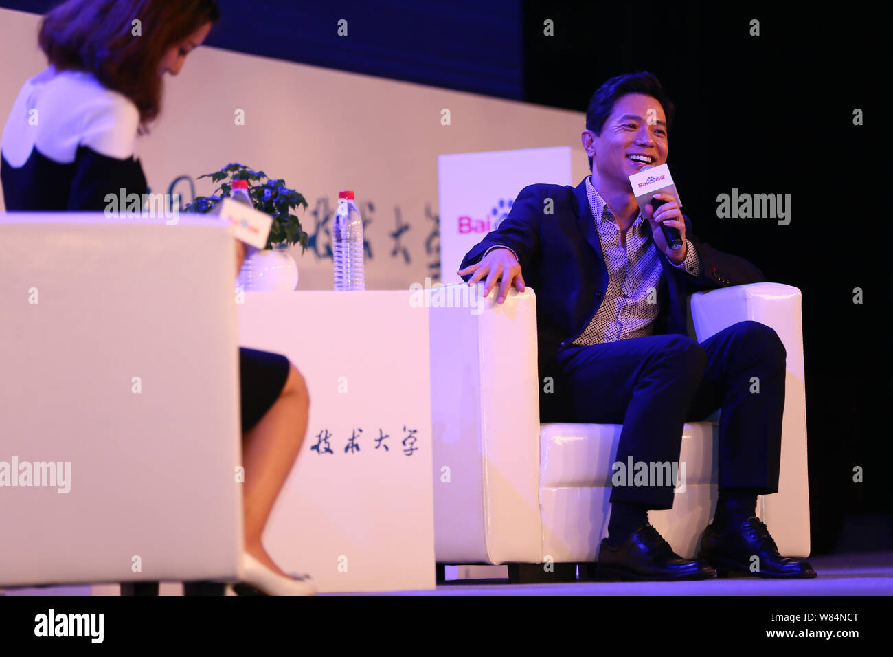 Robin Li Yanhong, Chairman and CEO of Baidu, attends a dialogue with ...