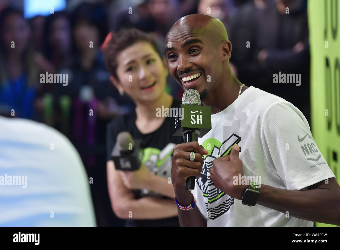 British Olympic distance running champion Mo Farah, front, singer and ...