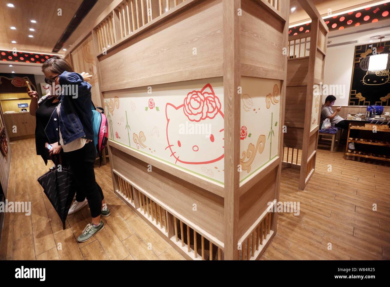 Girls visit the Hello Kitty hot-pot restaurant in Shanghai, China, 19 ...