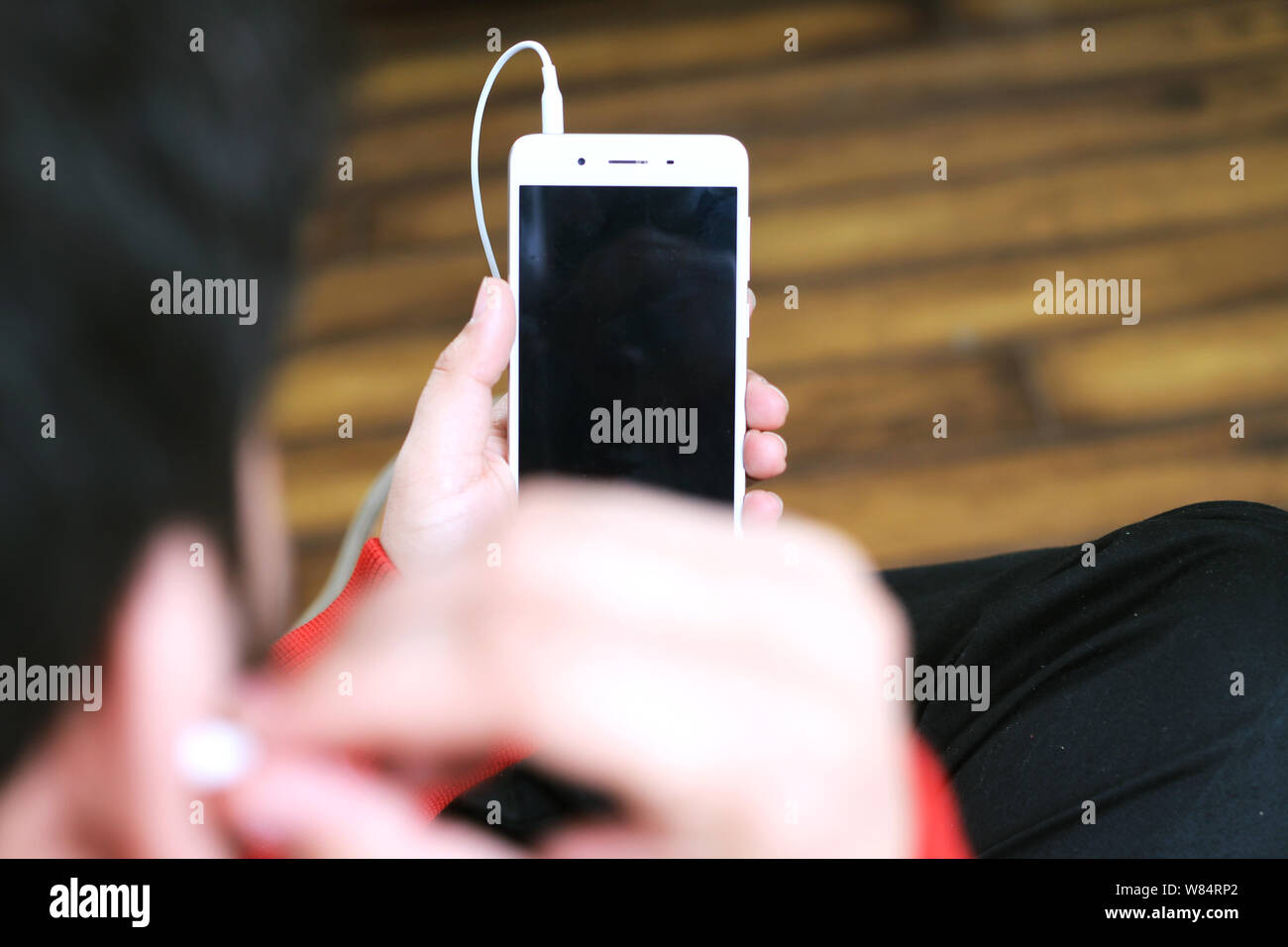 Picture of man holding a mobile in hand. Isolated on white background ...