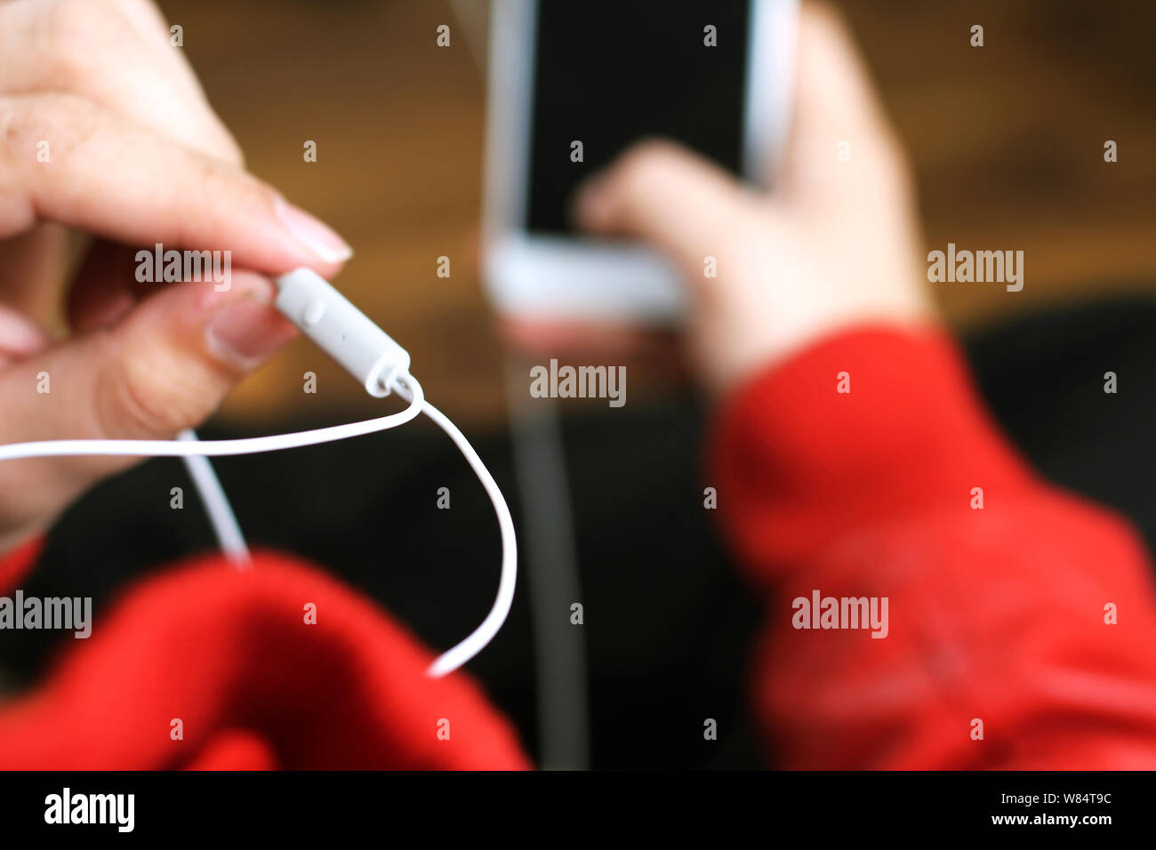 Picture of man holding a mobile in hand. Isolated on white background ...