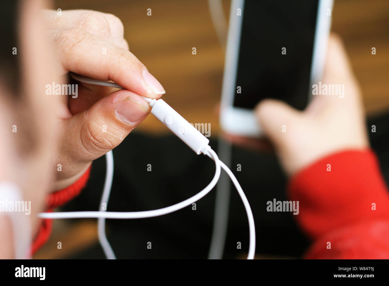 Picture of man holding a mobile in hand. Isolated on white background ...
