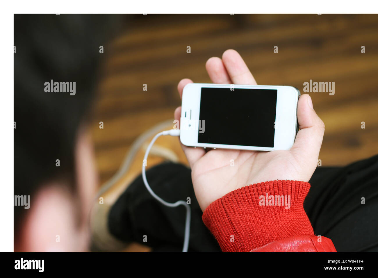 Picture of man holding a mobile in hand. Isolated on white background ...