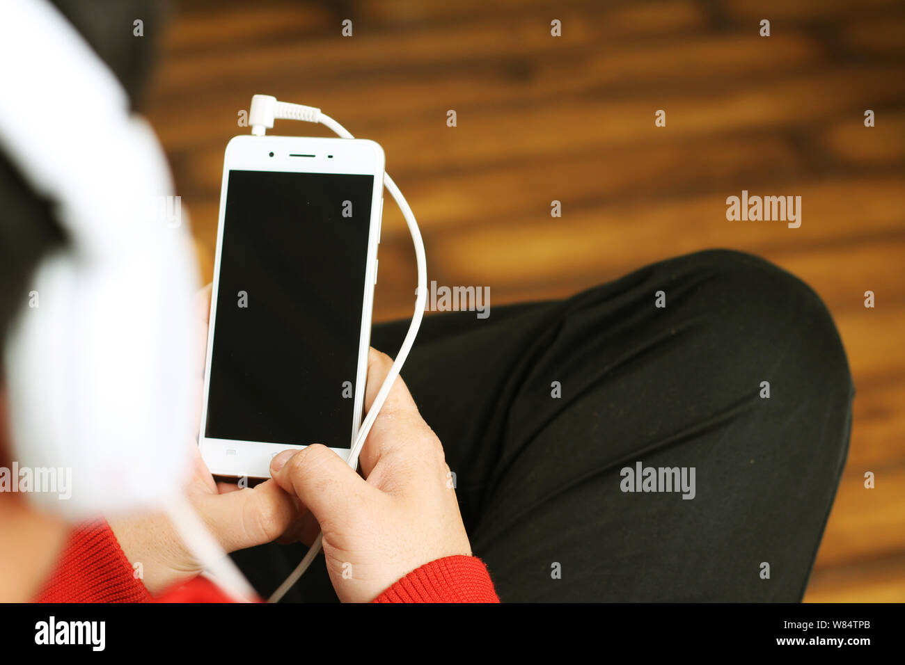 Picture of man holding a mobile in hand. Isolated on white background ...