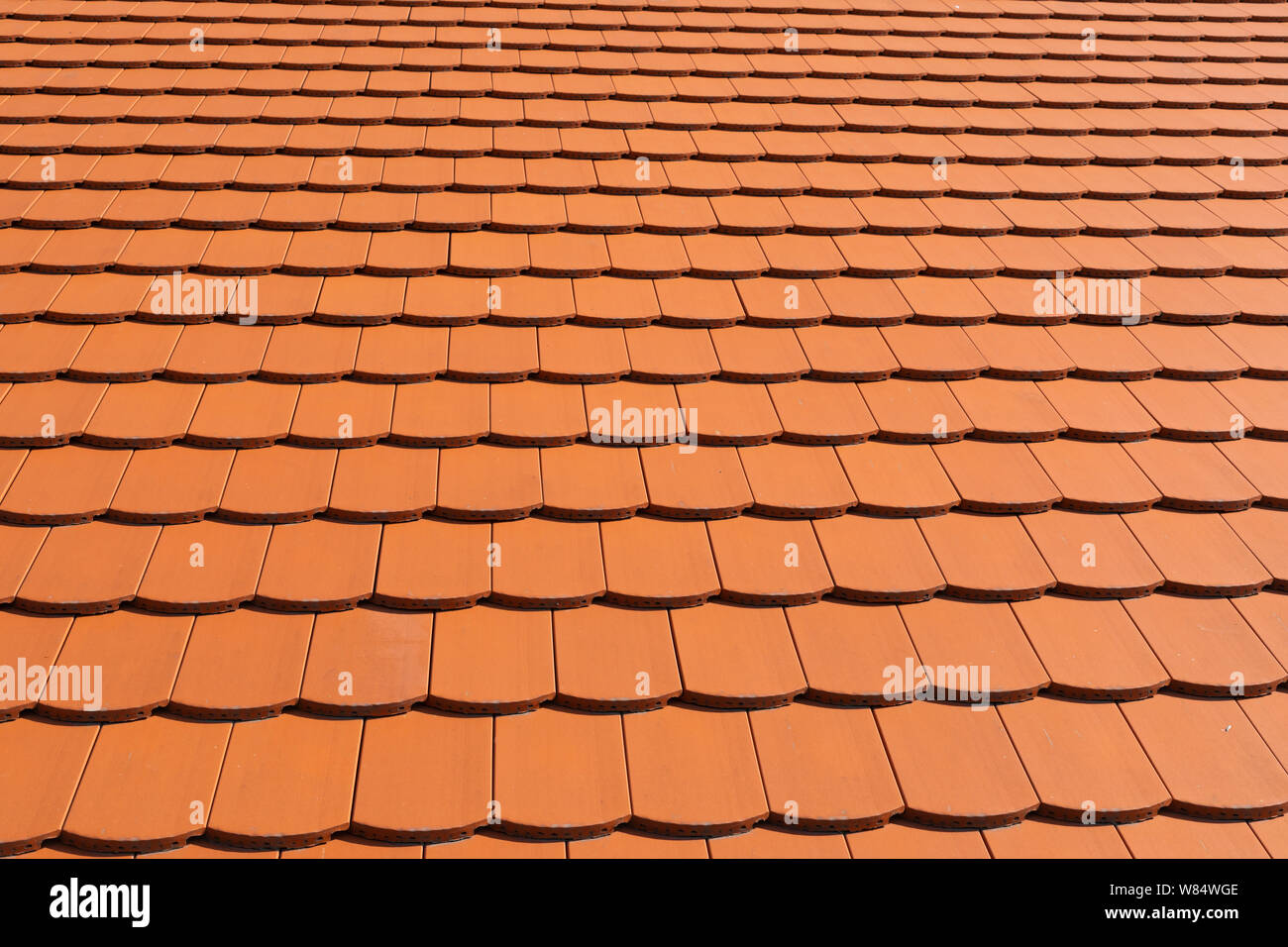 Top view of a brand new red roof tile Stock Photo - Alamy