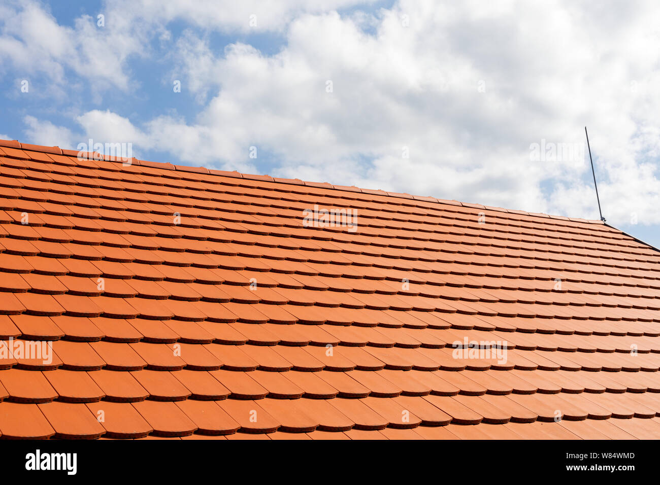 Top view of a brand new red roof tile Stock Photo - Alamy