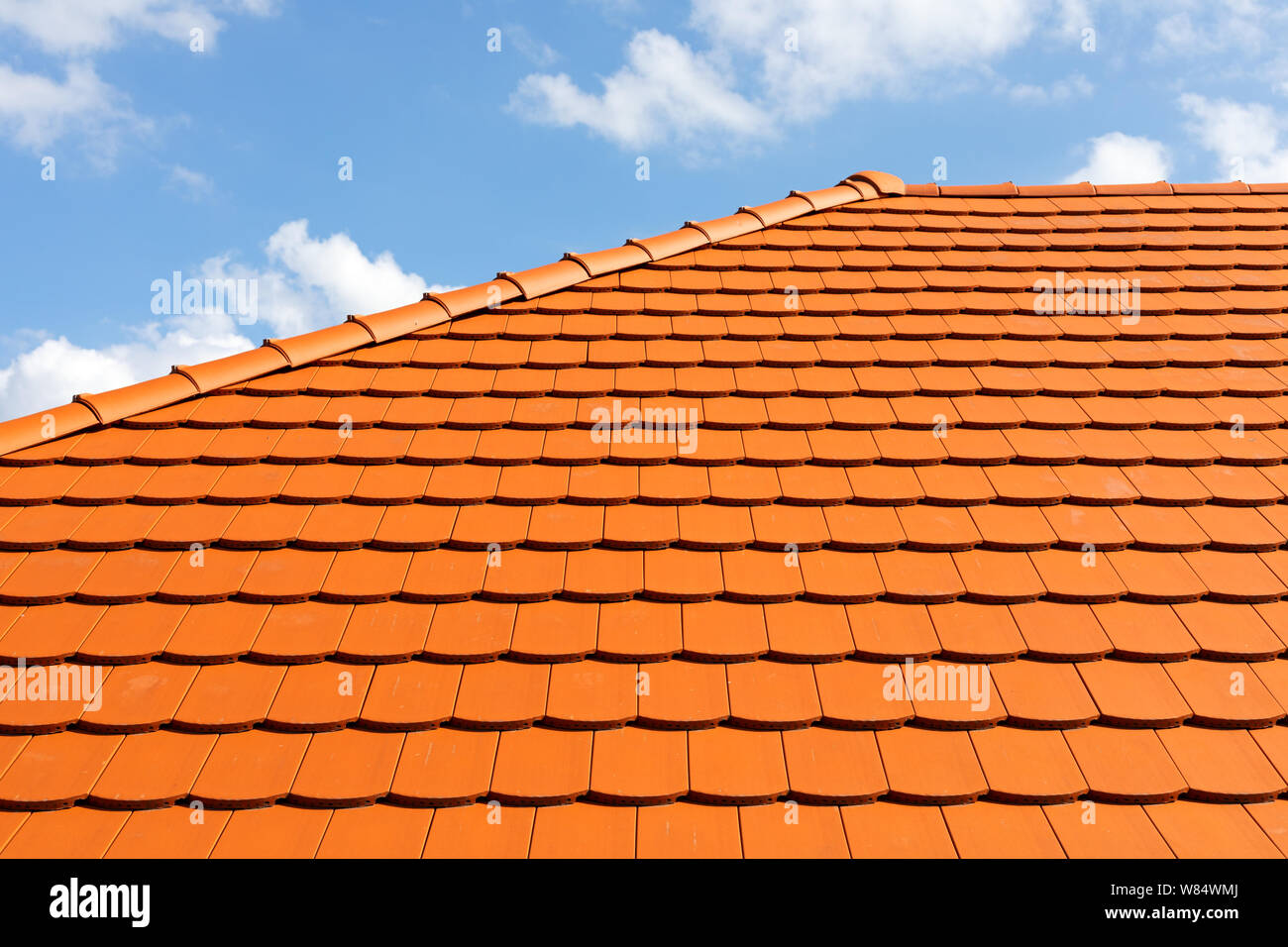 Top view of a brand new red roof tile Stock Photo - Alamy