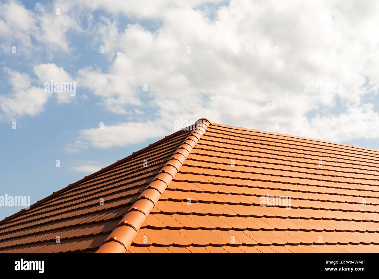 Top view of a brand new red roof tile Stock Photo - Alamy
