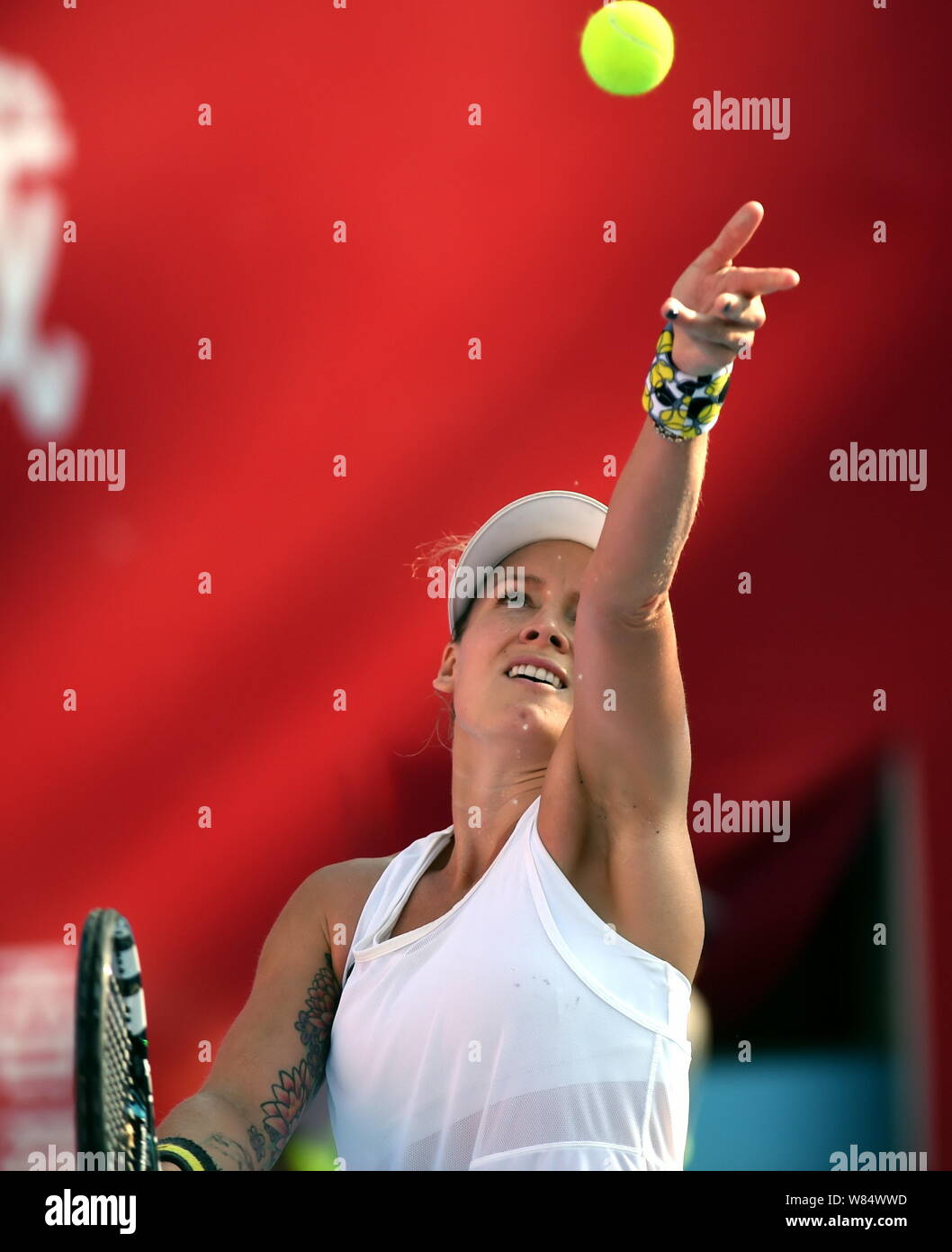 Bethanie Mattek-Sands of the United States serves against Caroline ...