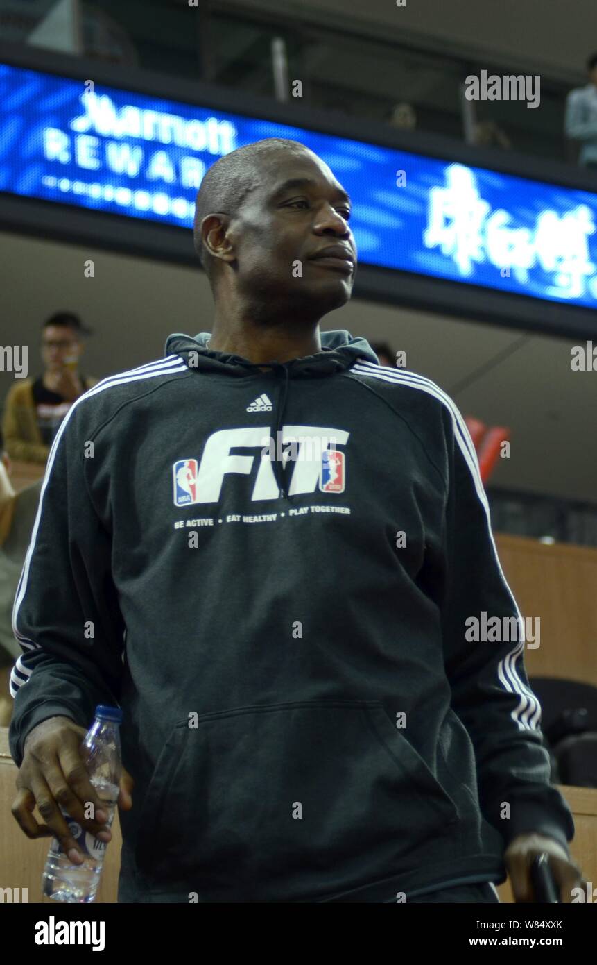 Retired Congolese NBA star Dikembe Mutombo takes part in a training ...