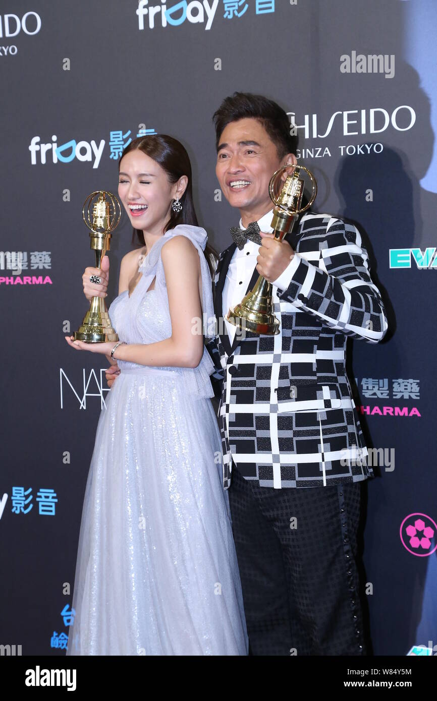 Taiwanese actor and variety show host Jacky Wu, right, and his daughter ...