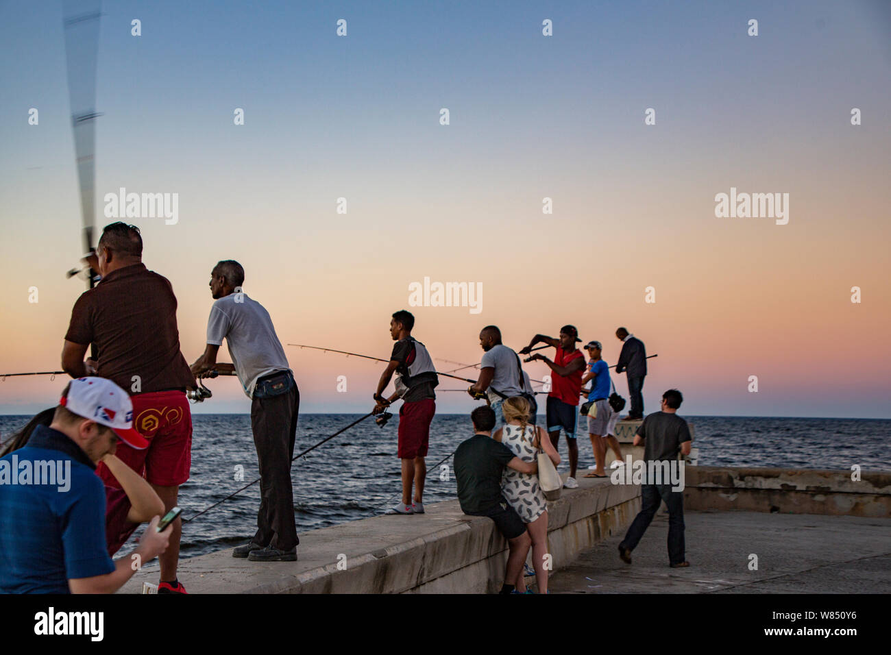 Men line up hi-res stock photography and images - Alamy