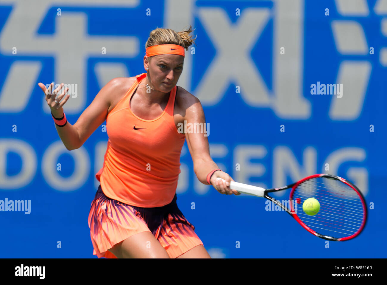 Petra Kvitova of Czech Republic returns a shot to Jelena Ostapenko of ...
