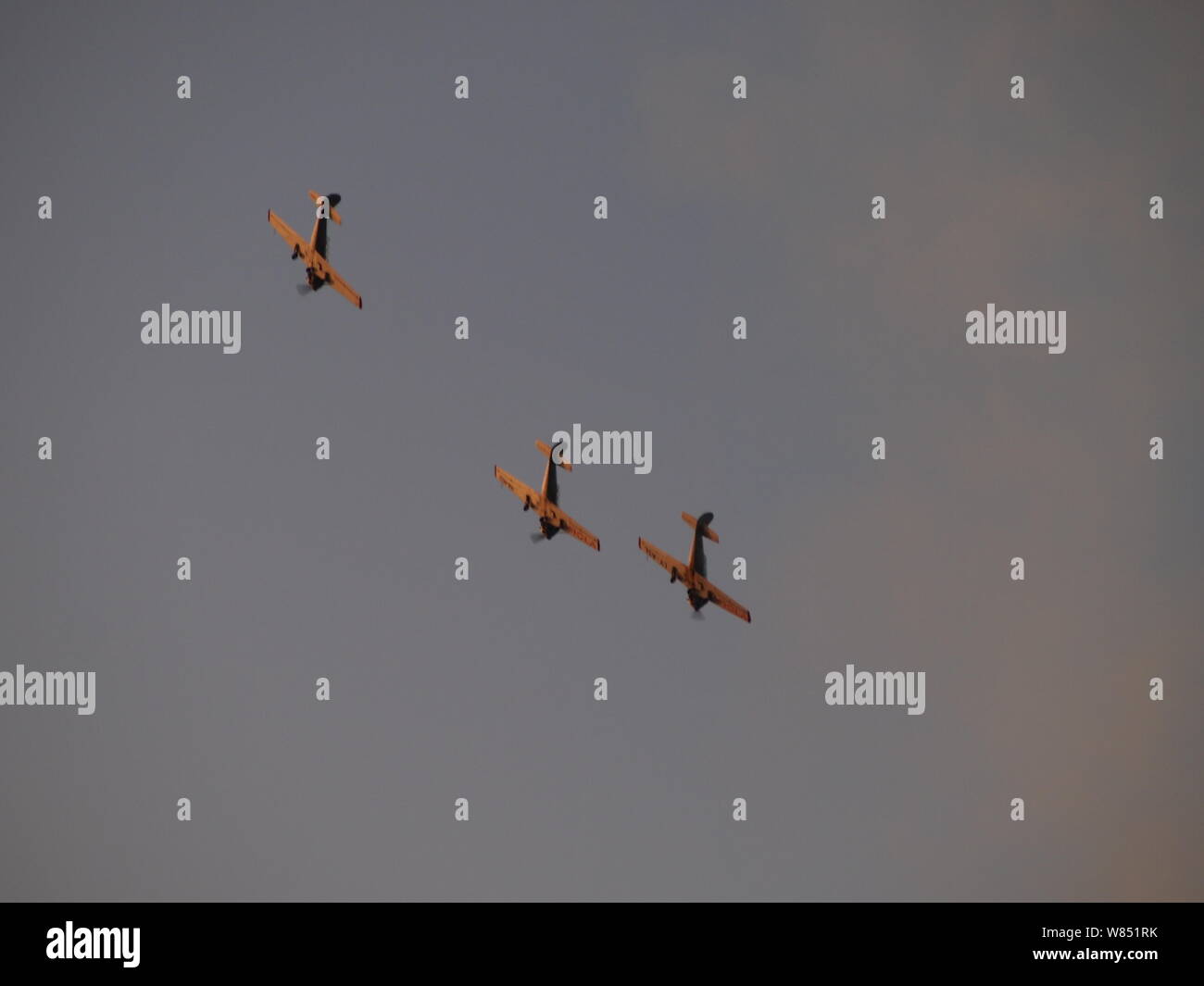Three propeller planes in aerobatic display Stock Photo - Alamy