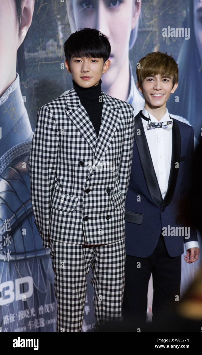 Chinese writer and director Guo Jingming, right, and boy group TFBOYS ...