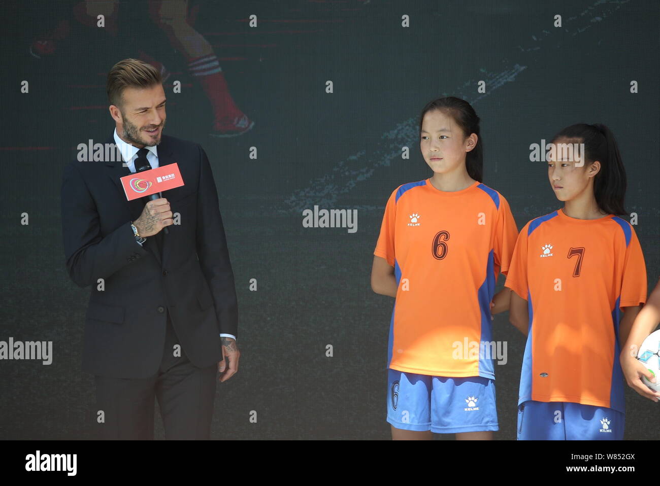 English soccer star David Beckham, left, attends a press conference for ...